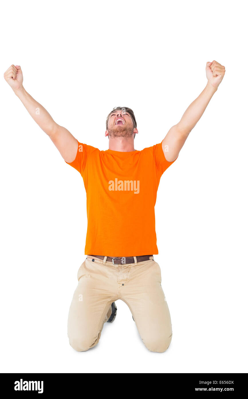 Young man in orange Cut Out Stock Images & Pictures - Alamy