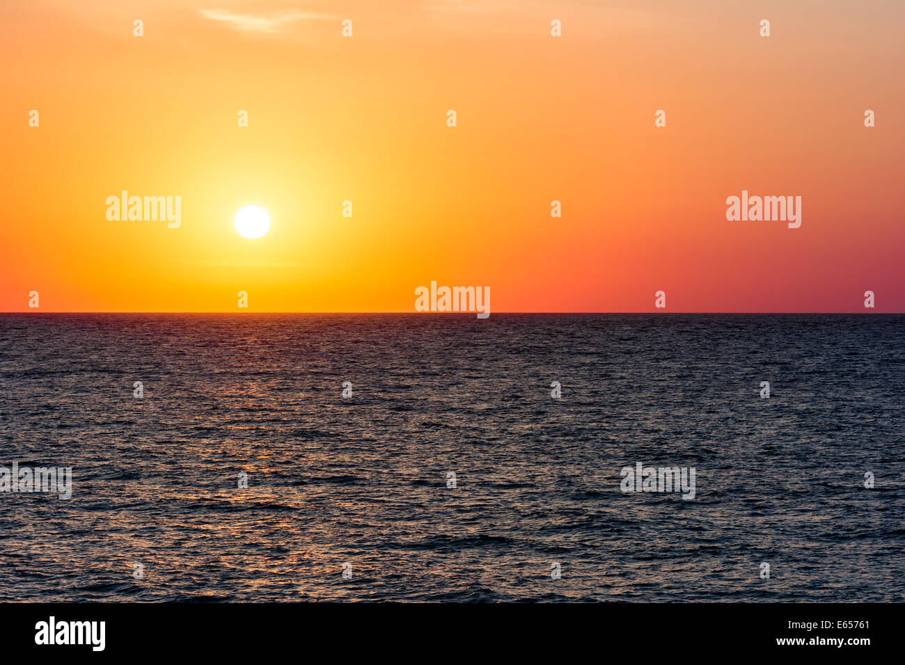 Orange Morning Sky Sunrise Over The Ocean Stock Photo - Alamy