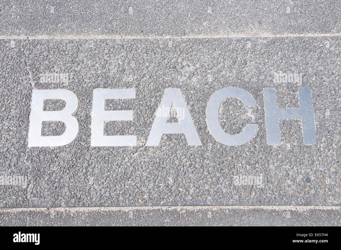 silver beach sign pavement Stock Photo - Alamy