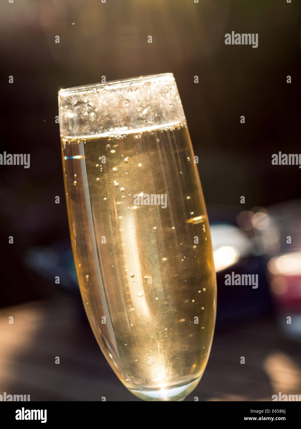 Close up of bubbles in a glass of champagne Stock Photo - Alamy