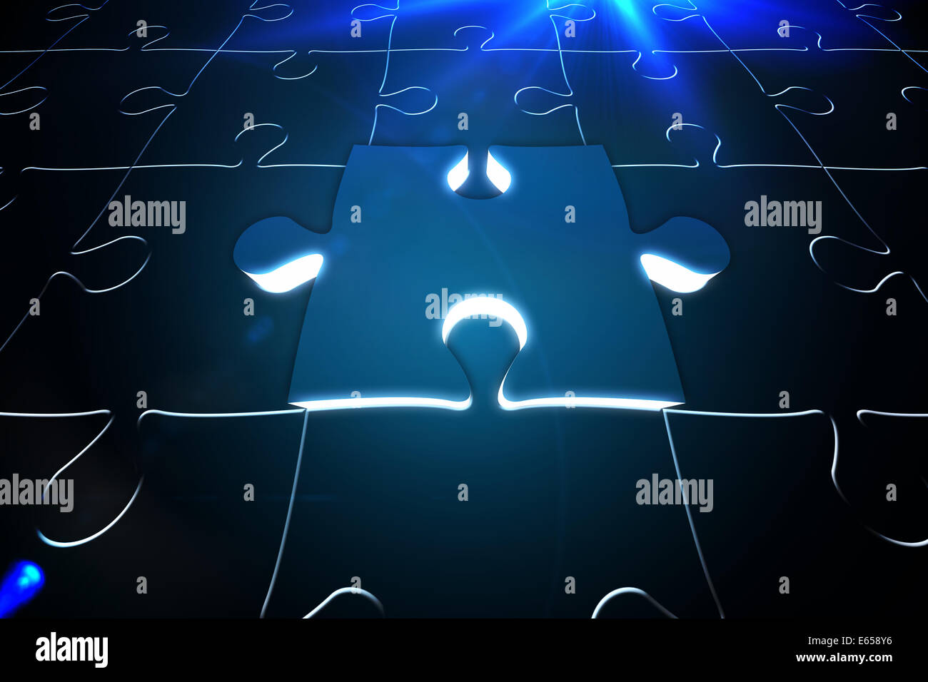 Blue glowing jigsaw piece on puzzle Stock Photo - Alamy
