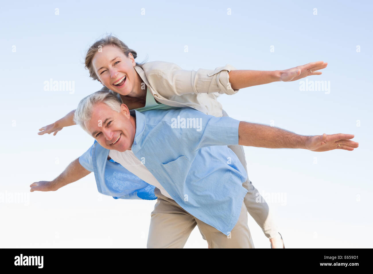 Happy casual couple having fun Stock Photo - Alamy