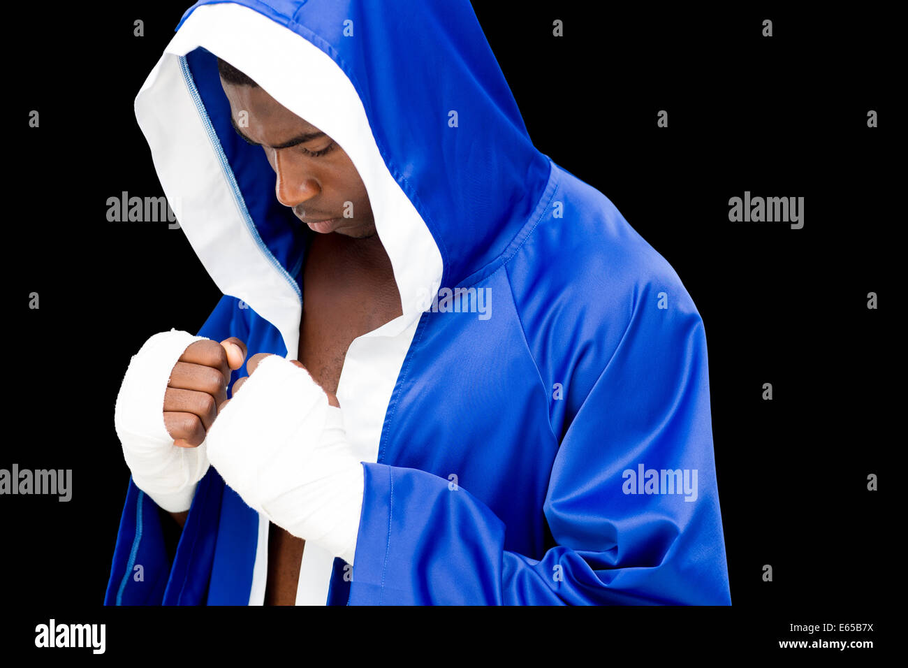 Muscular boxer in in blue hood Stock Photo - Alamy