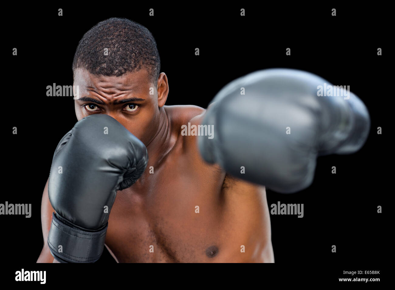 Young shirtless male boxer attacking with his left Stock Photo - Alamy