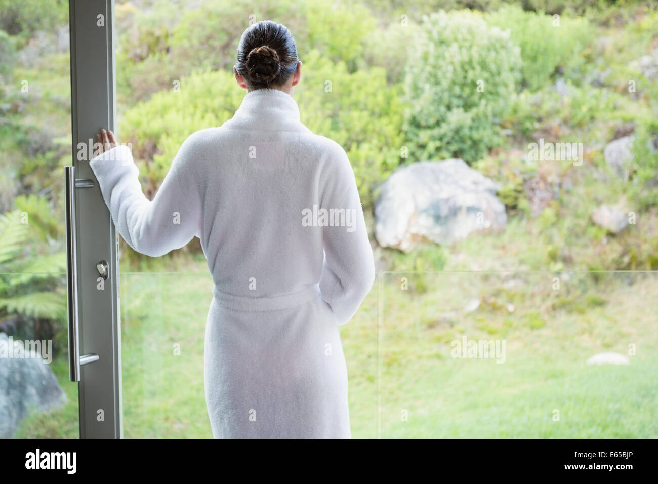 Wearing a white bathrobe hi-res stock photography and images - Alamy