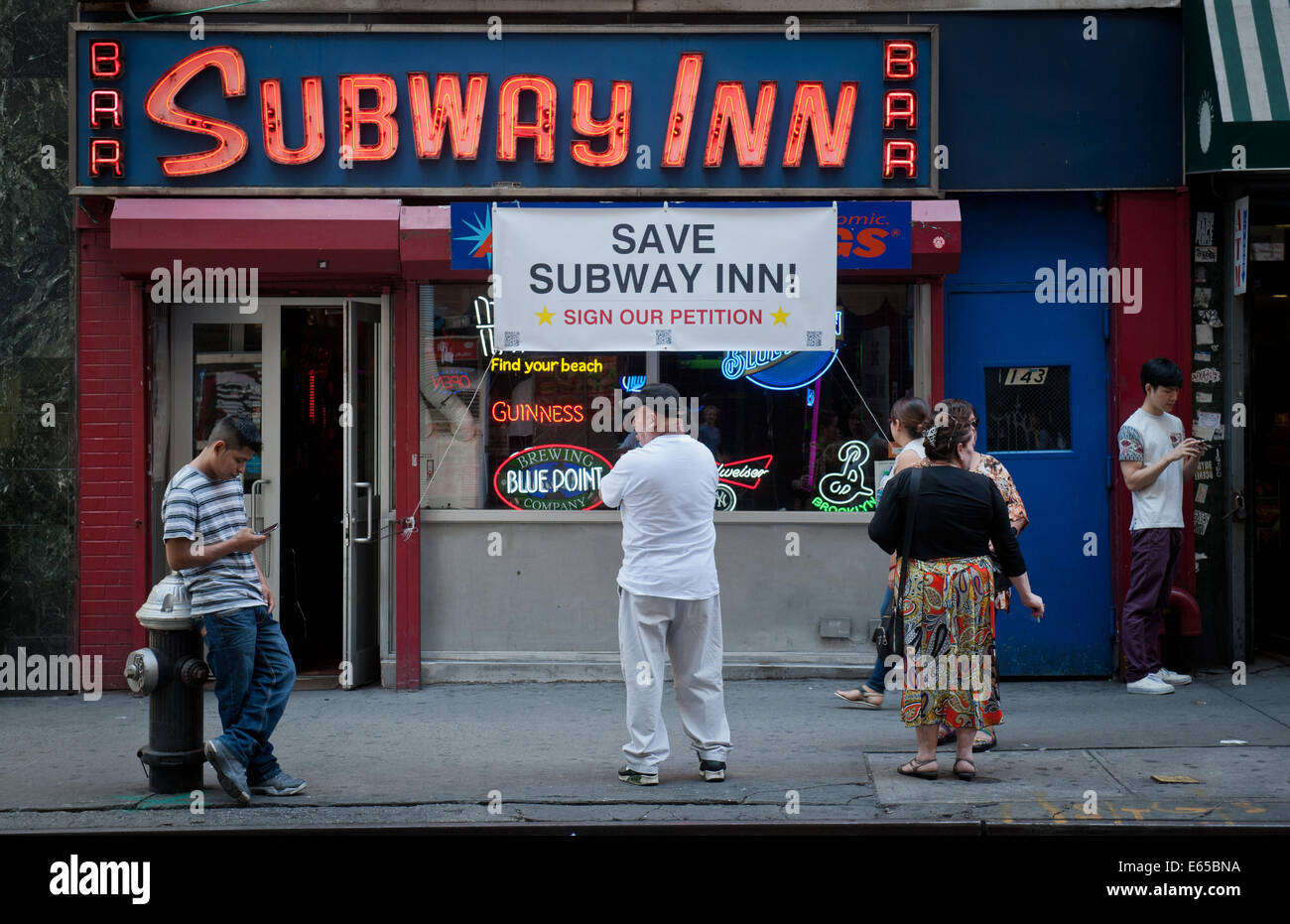 Manhattan, New York, USA. 14th Aug, 2014. The owners of Subway Inn on ...