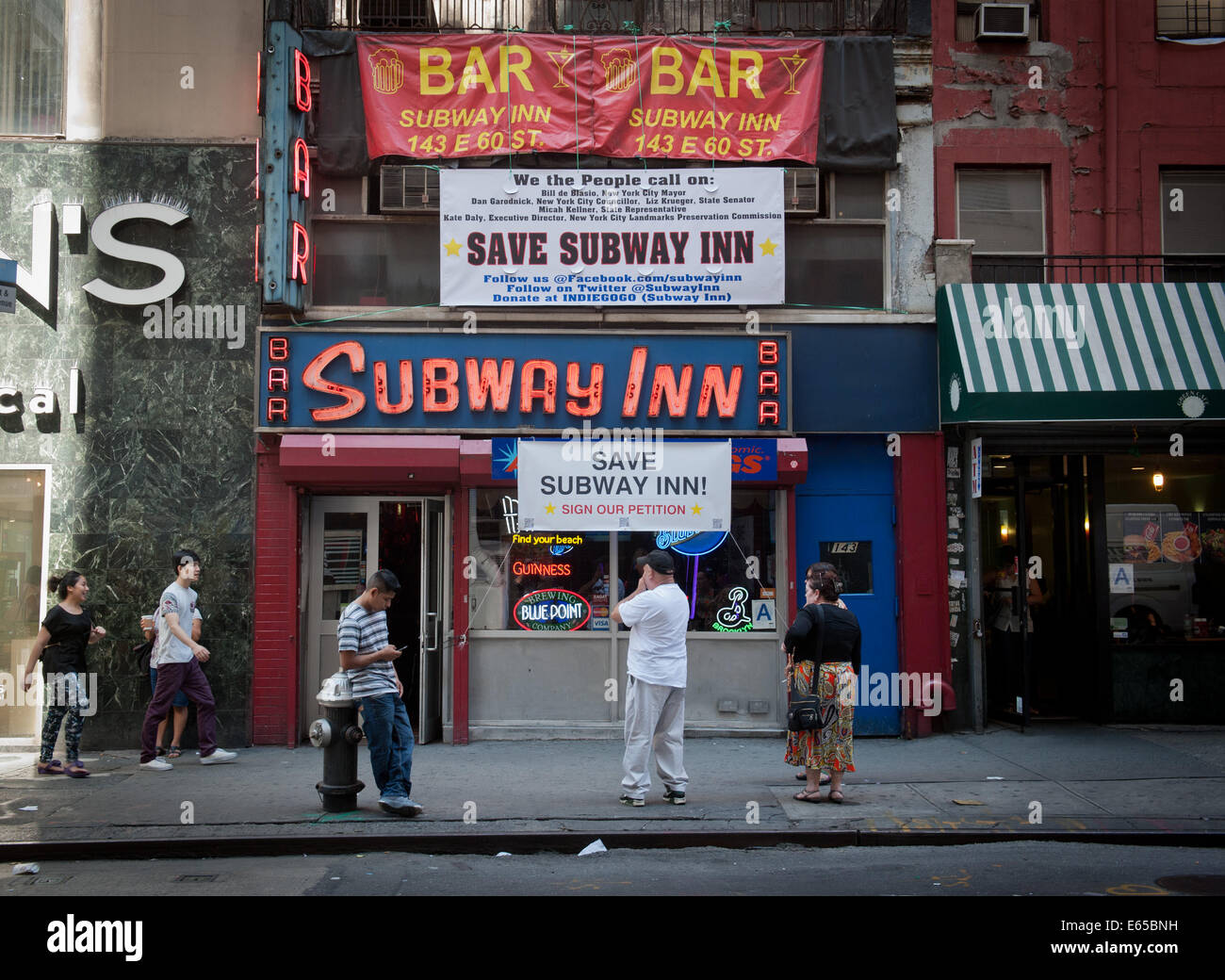 Manhattan, New York, USA. 14th Aug, 2014. The owners of Subway Inn on ...
