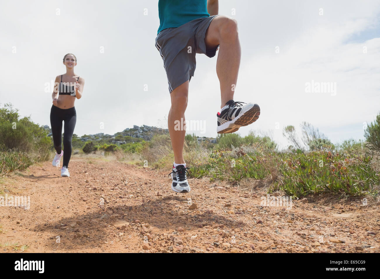 Woman jogging on countryside road hi-res stock photography and images ...
