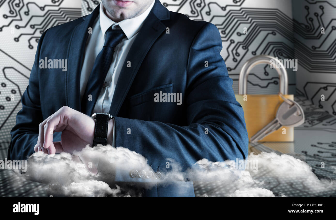 Composite image of businessman checking the time on watch Stock Photo ...