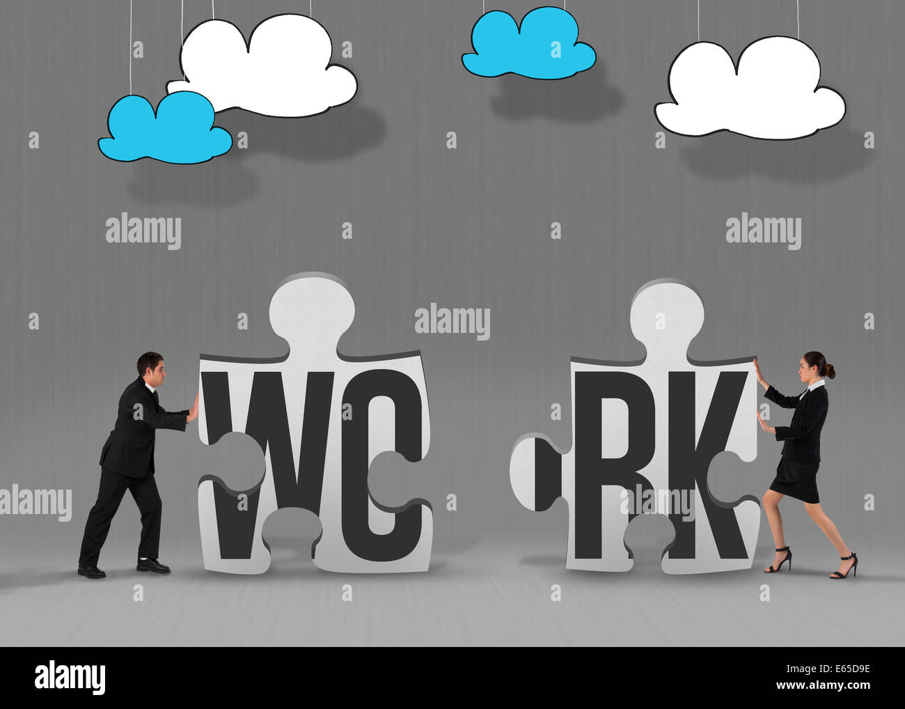 Work against grey jigsaw pieces Stock Photo - Alamy