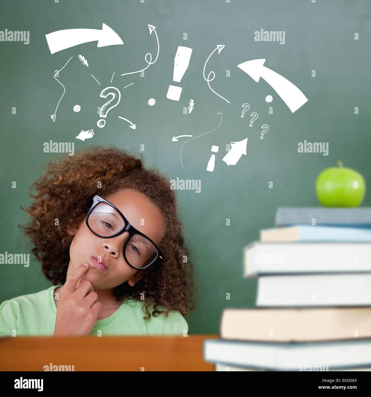 Composite image of cute pupil thinking Stock Photo - Alamy