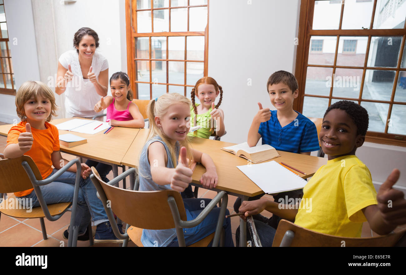 Girl standing up desk classroom hi-res stock photography and images - Alamy