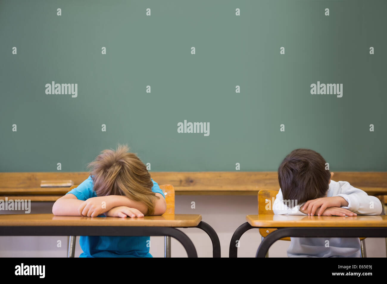 Asian boy sleeping in classroom hi-res stock photography and images - Alamy