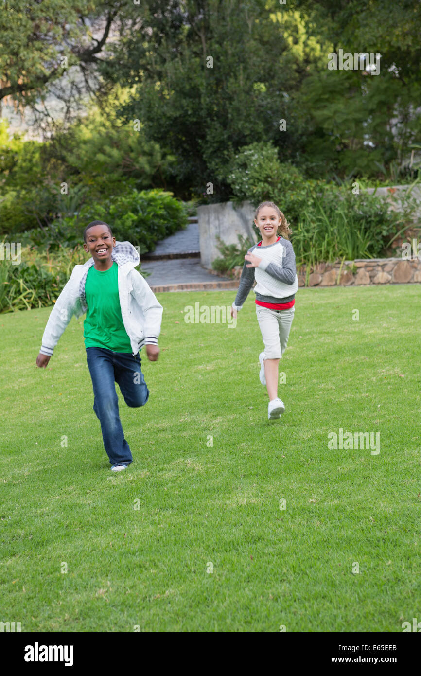Boy girl running towards camera hi-res stock photography and images - Alamy