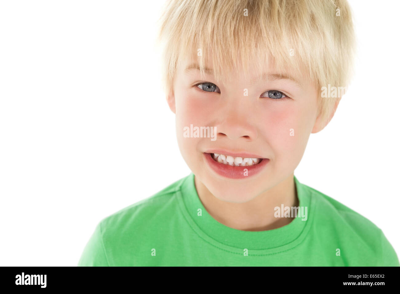 Cute little boy smiling at camera Stock Photo - Alamy