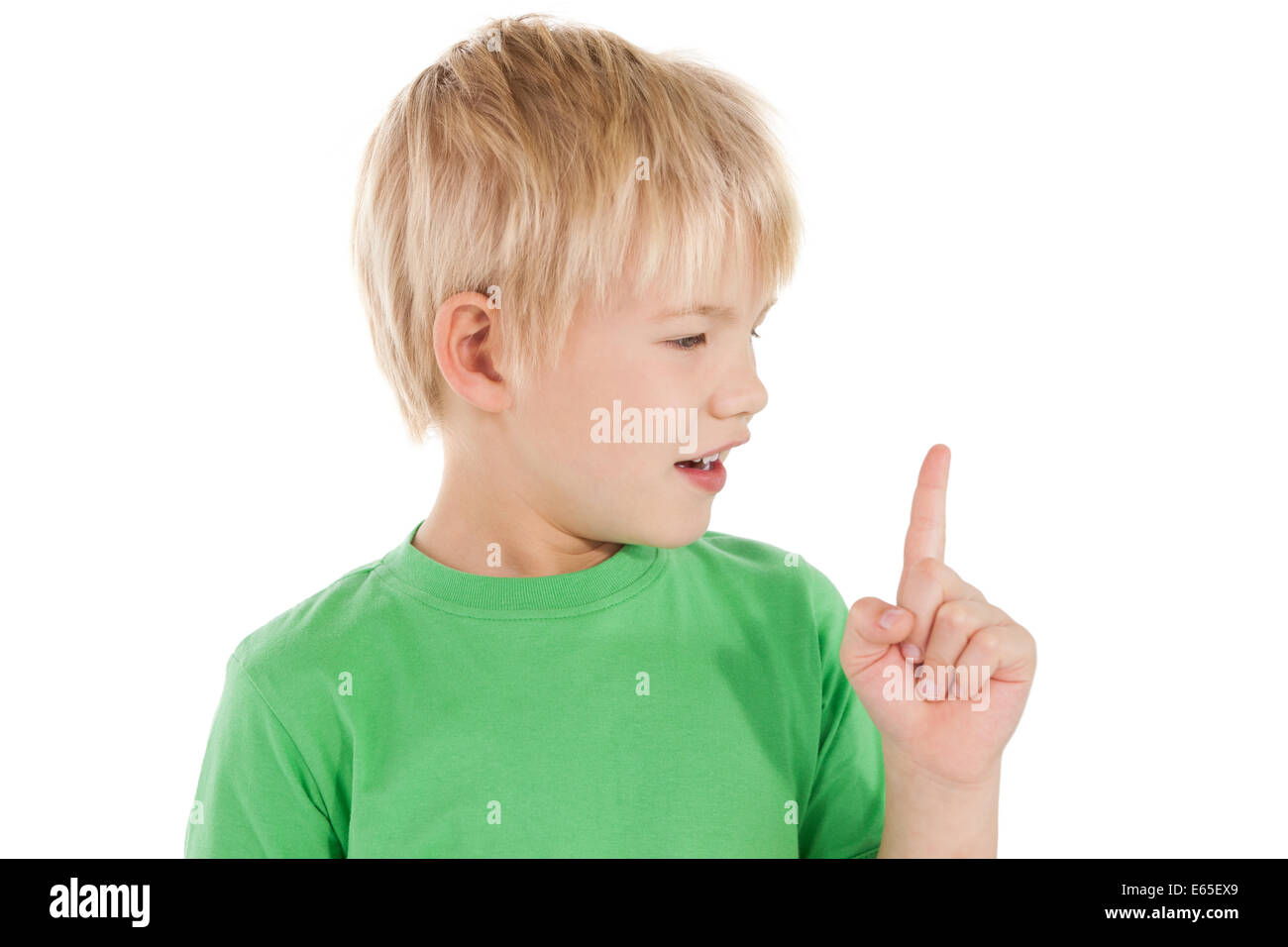 Surprised little boy pointing up Stock Photo - Alamy