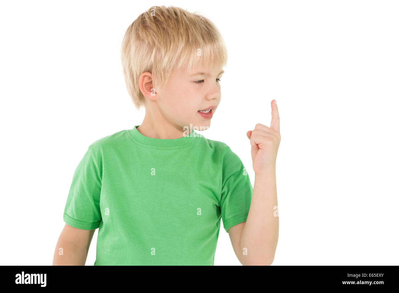 Cute little boy pointing up Stock Photo - Alamy