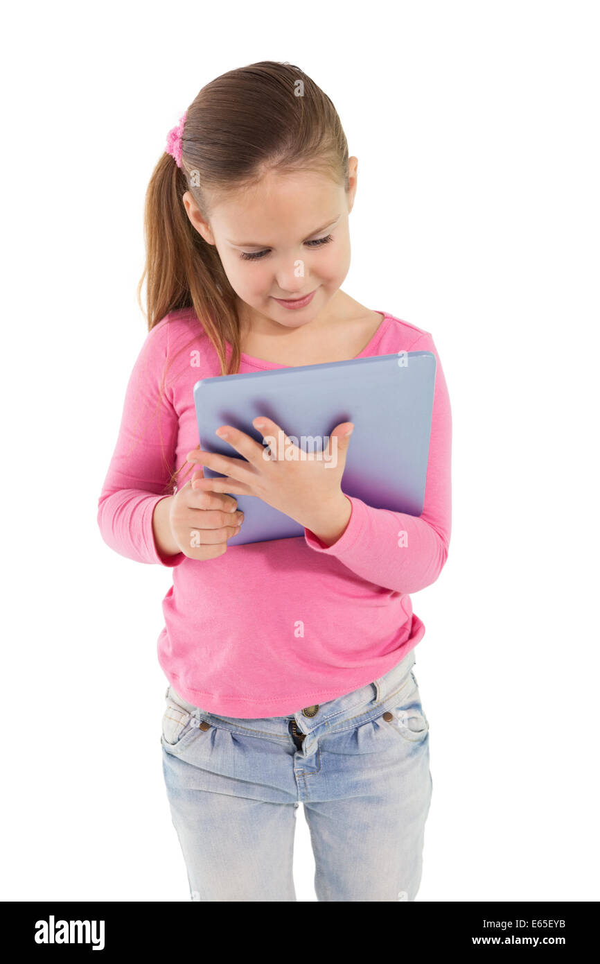 Cute little girl using tablet hi-res stock photography and images - Alamy