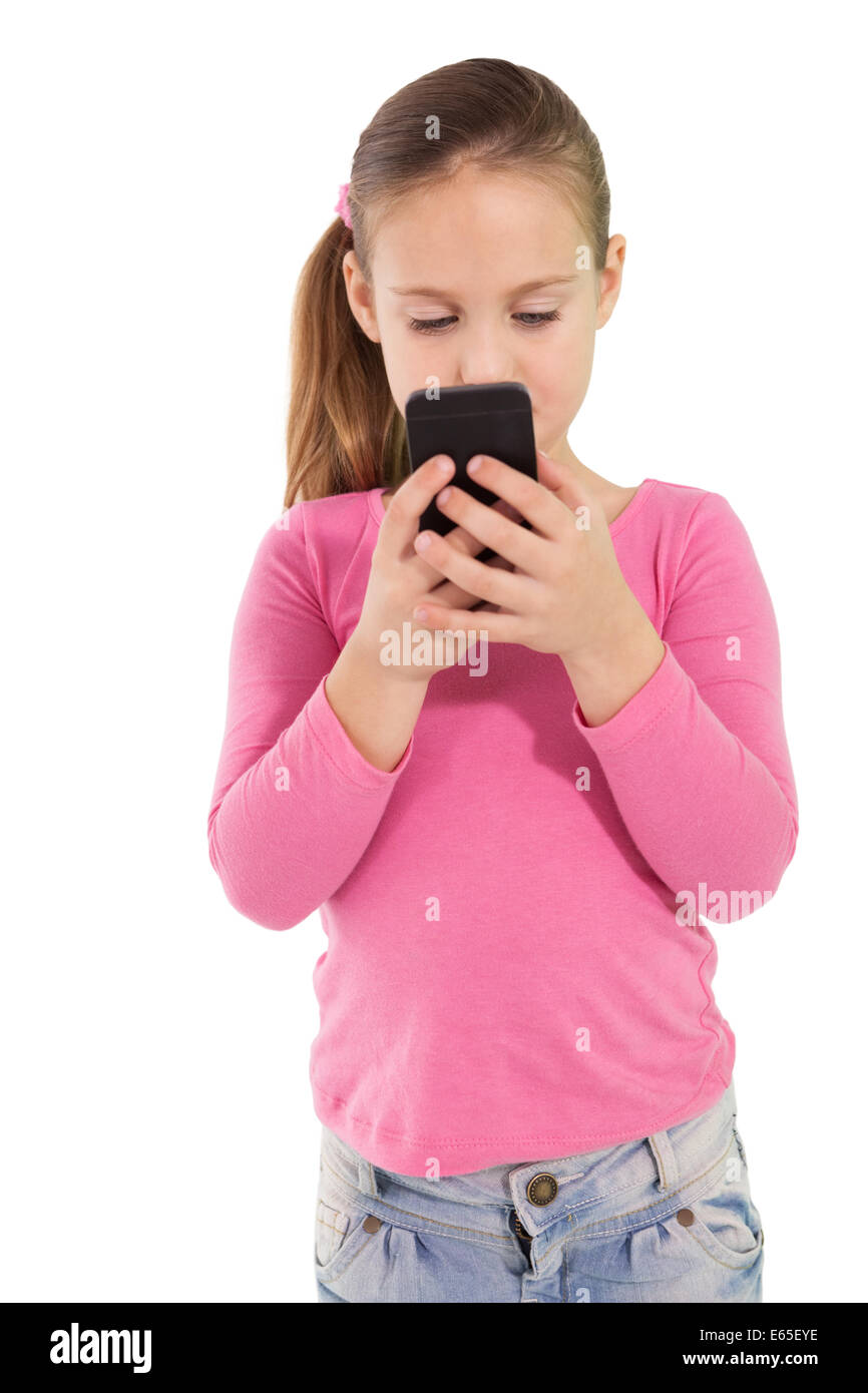 Cute little girl using smartphone Stock Photo - Alamy