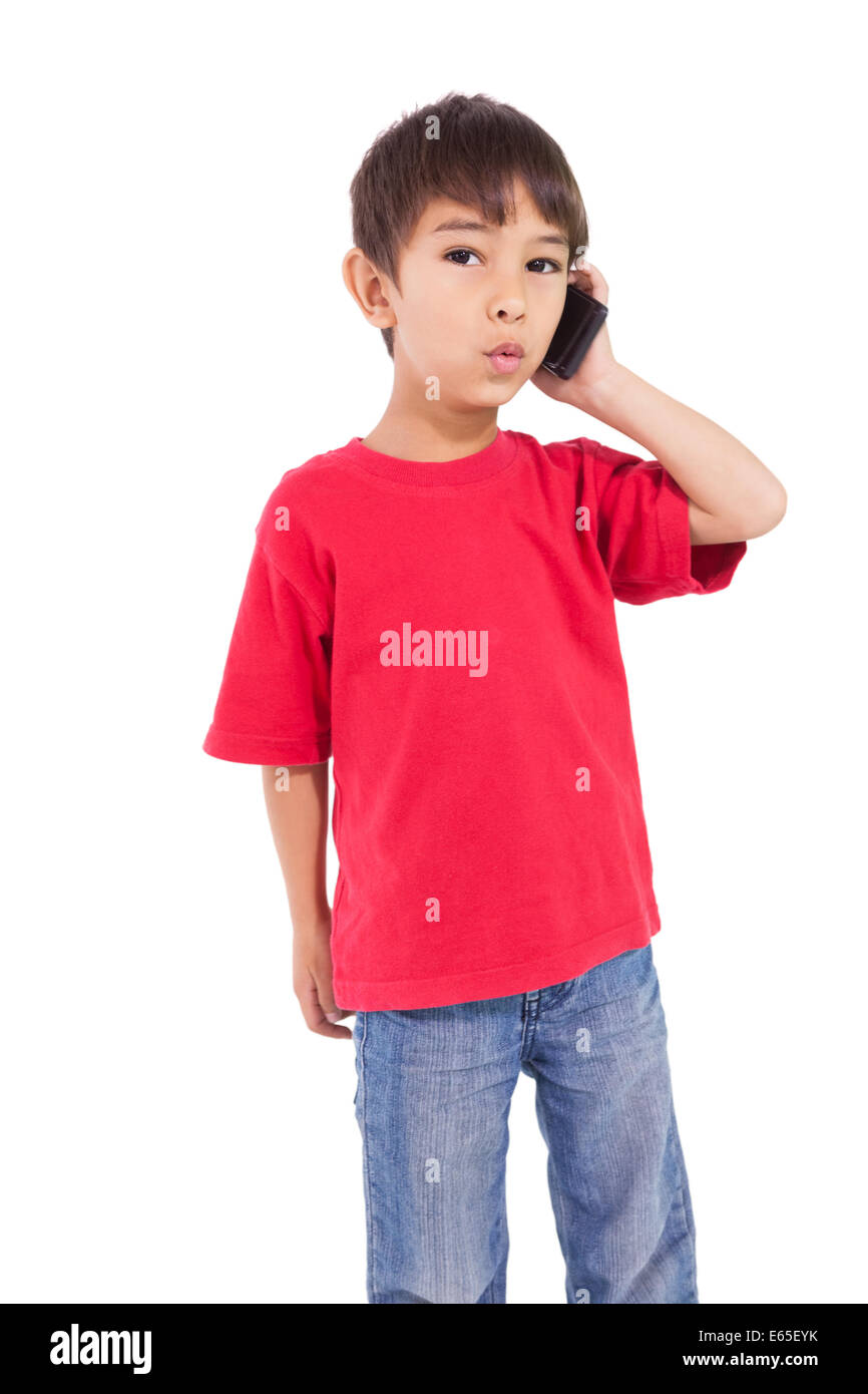 Cute little boy talking on smartphone Stock Photo - Alamy