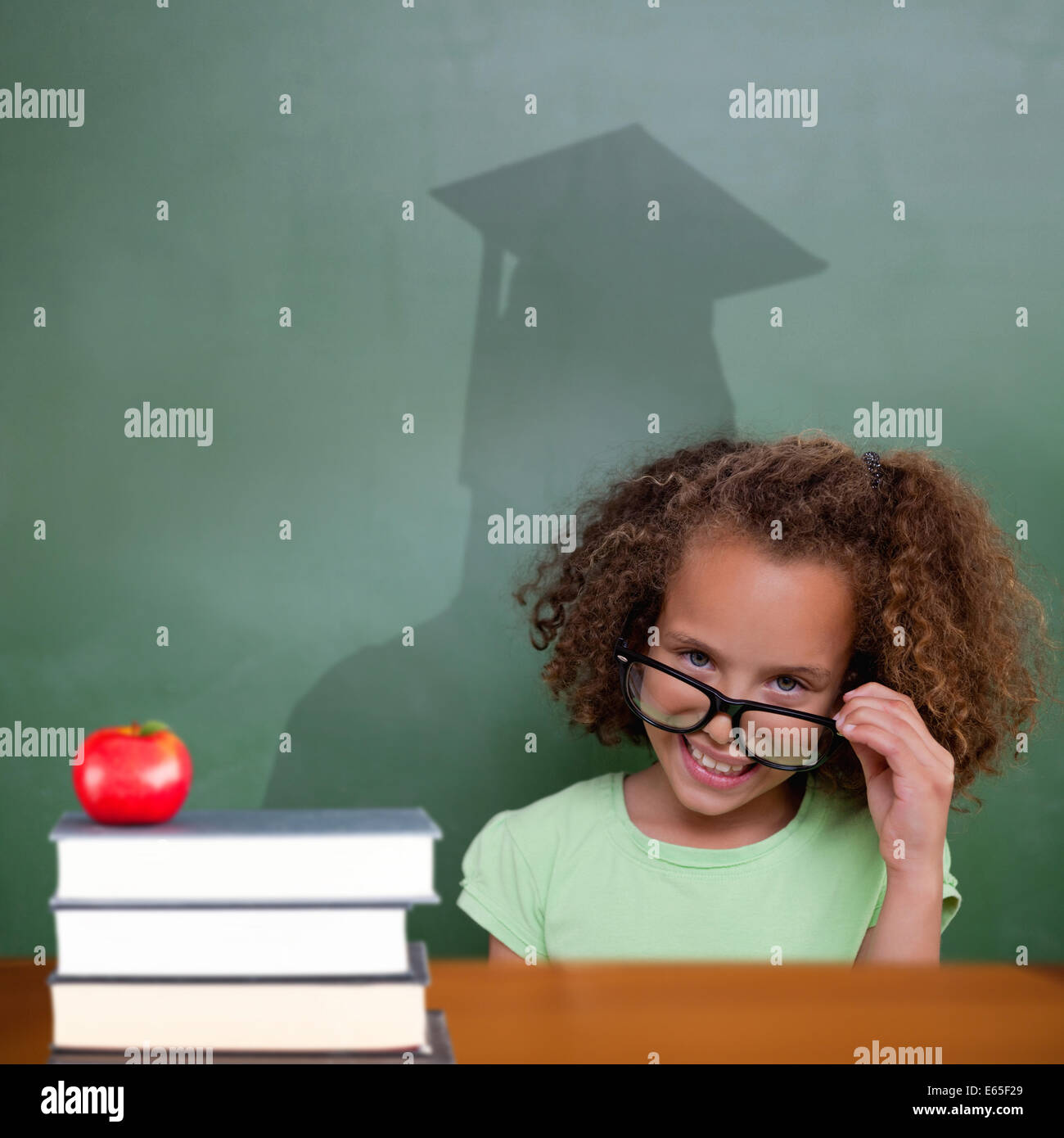 Composite image of cute pupil with graduate shadow Stock Photo - Alamy