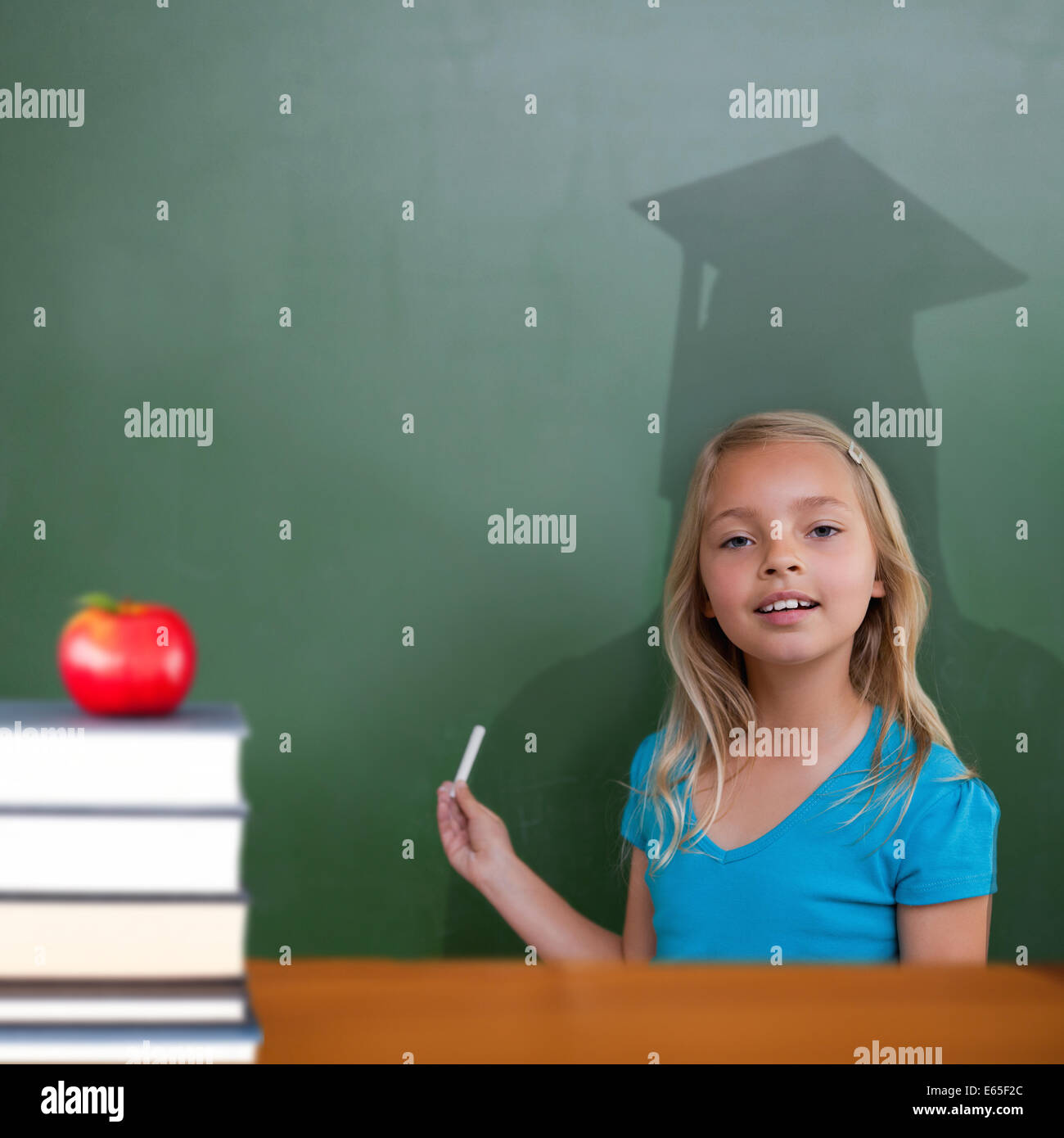 Composite image of cute pupil with graduate shadow Stock Photo - Alamy