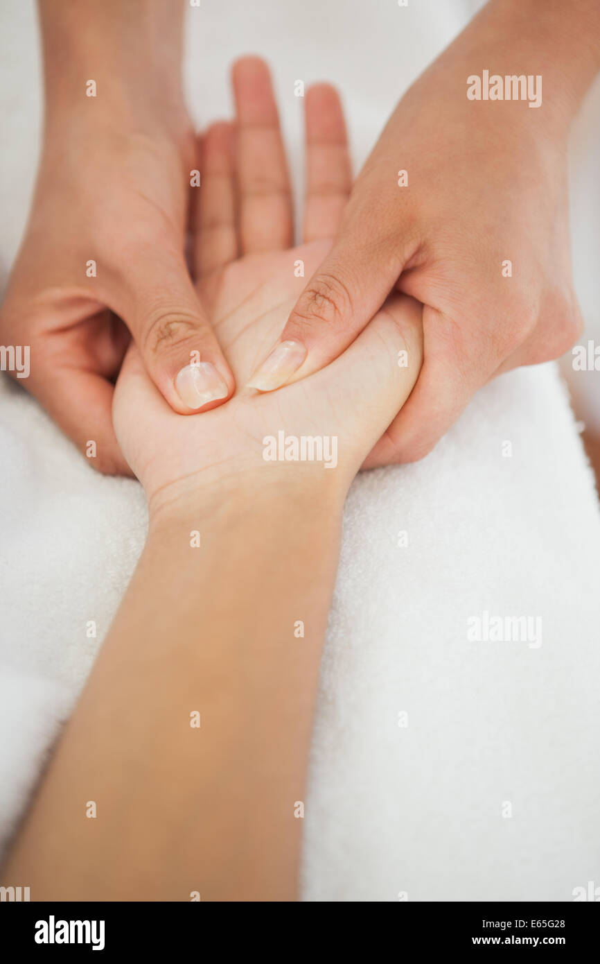 Woman receiving a hand massage Stock Photo - Alamy