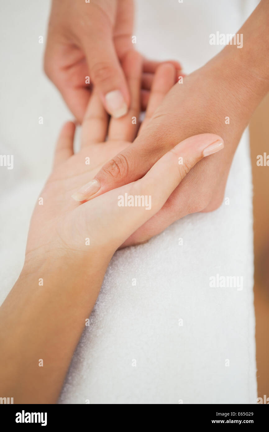 Woman receiving a hand massage Stock Photo - Alamy
