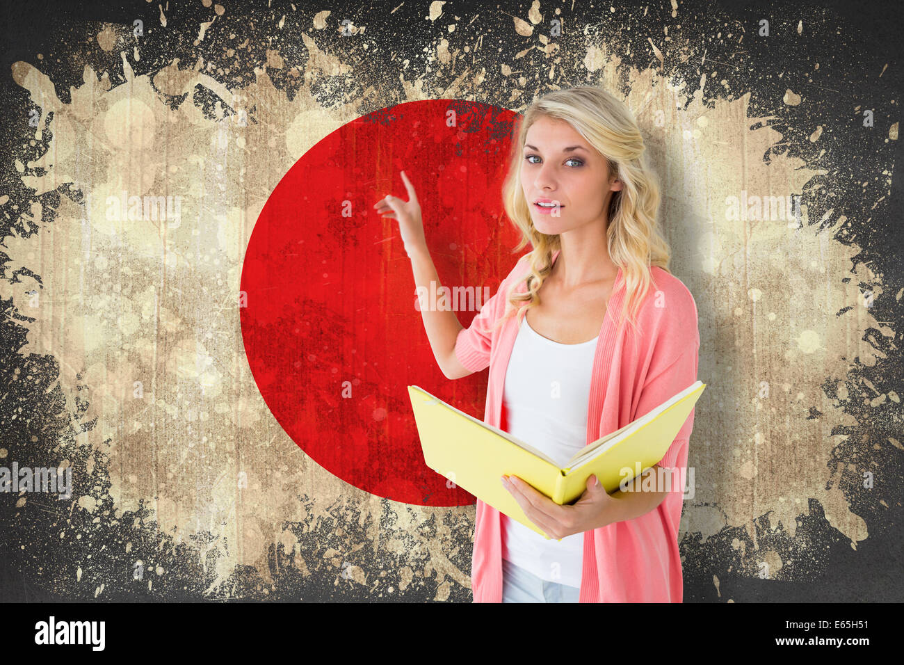 Happy student pointing digital hi-res stock photography and images - Alamy