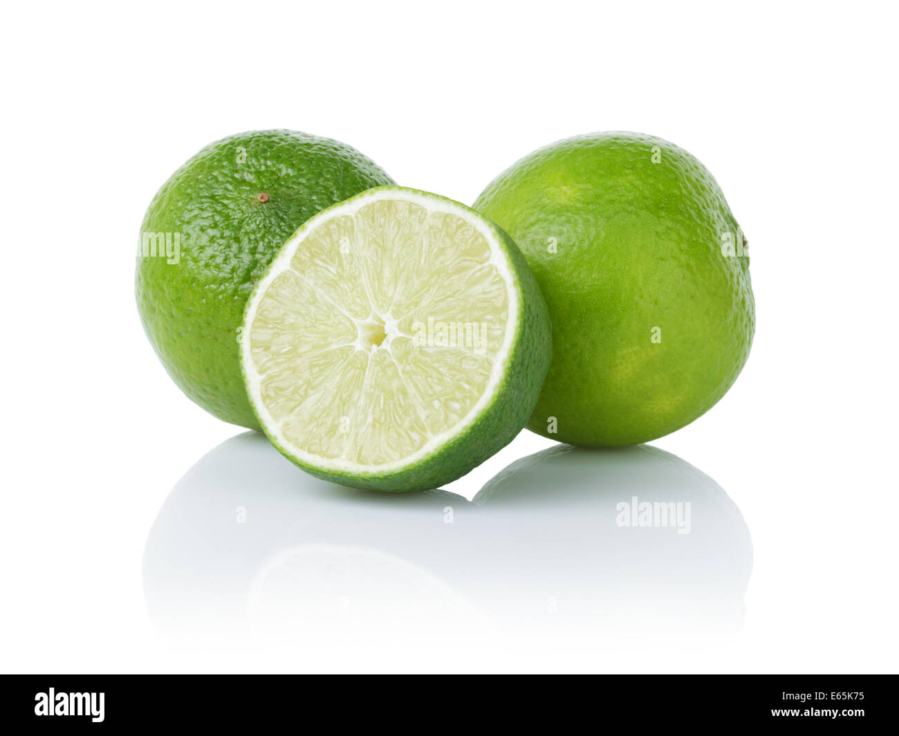 ripe limes with half, isolated on white background Stock Photo - Alamy