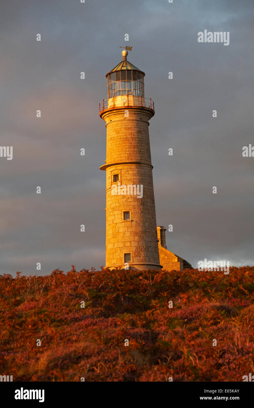 Old Light House lighthouse in golden light of evening on Lundy Island ...