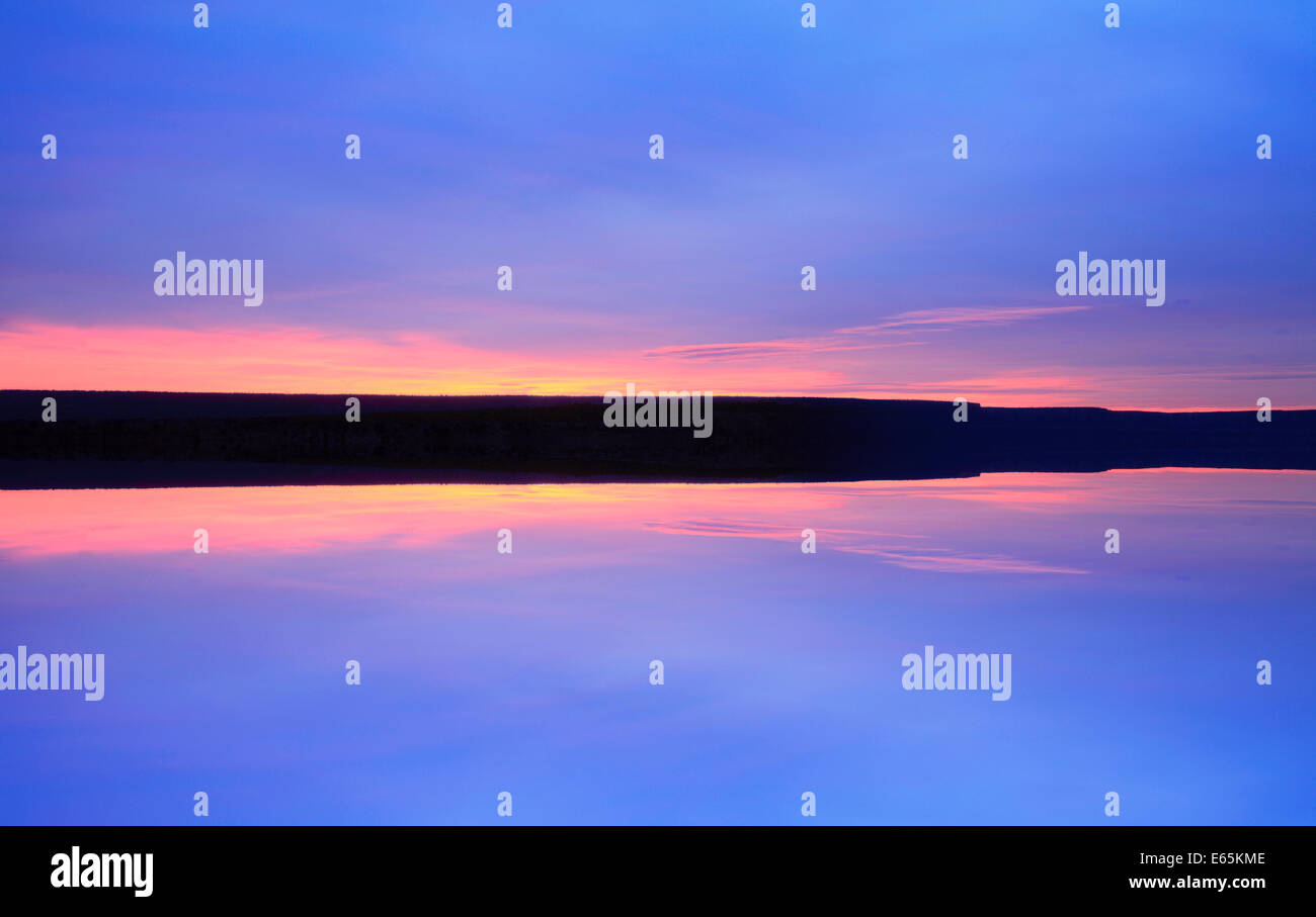 A Symmetrical Blue Sunset Sky And Nature Background Stock Photo - Alamy