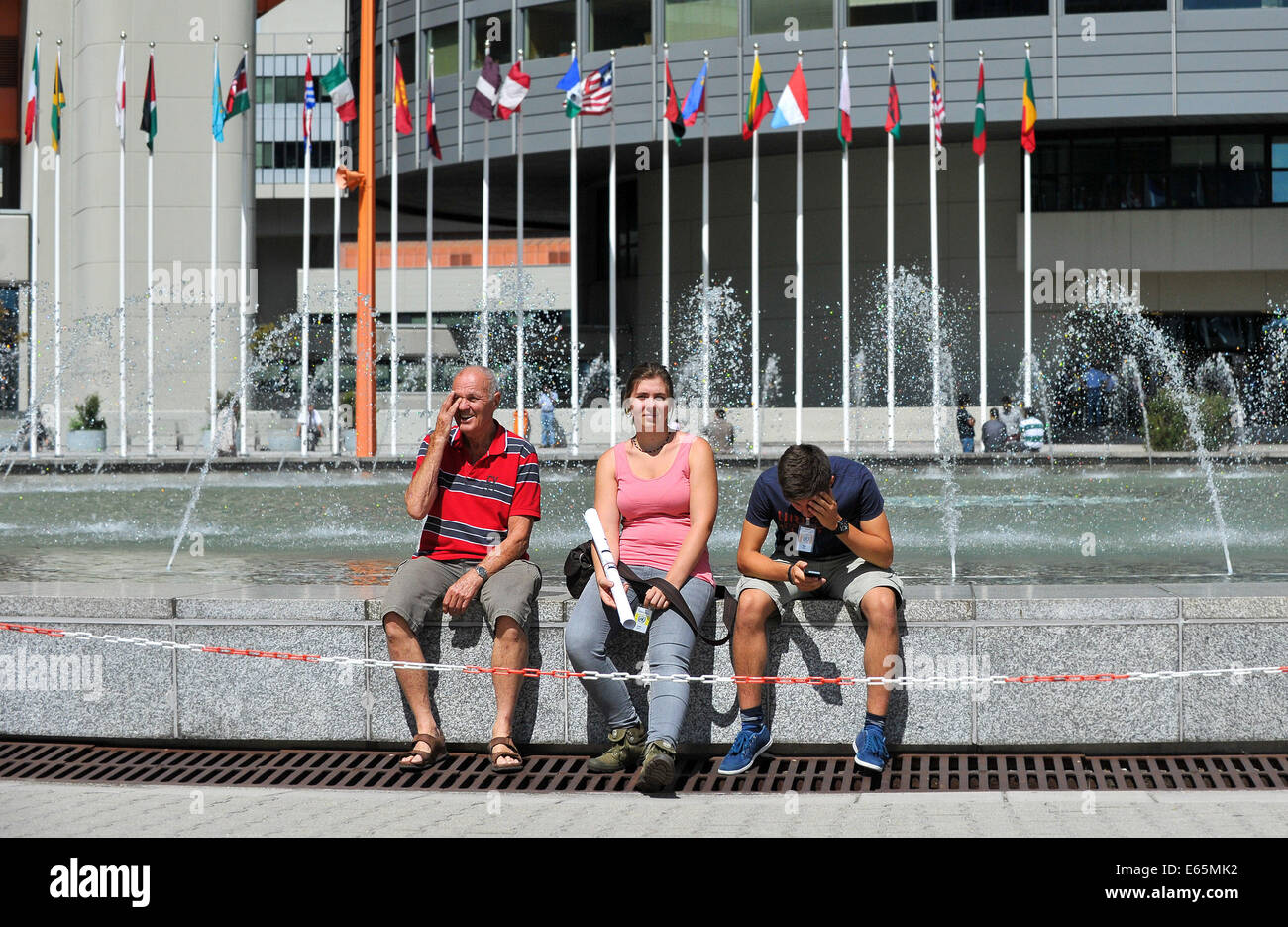 Vienna, Aug. 15th Aug, 2014. People rest after their visit to the ...