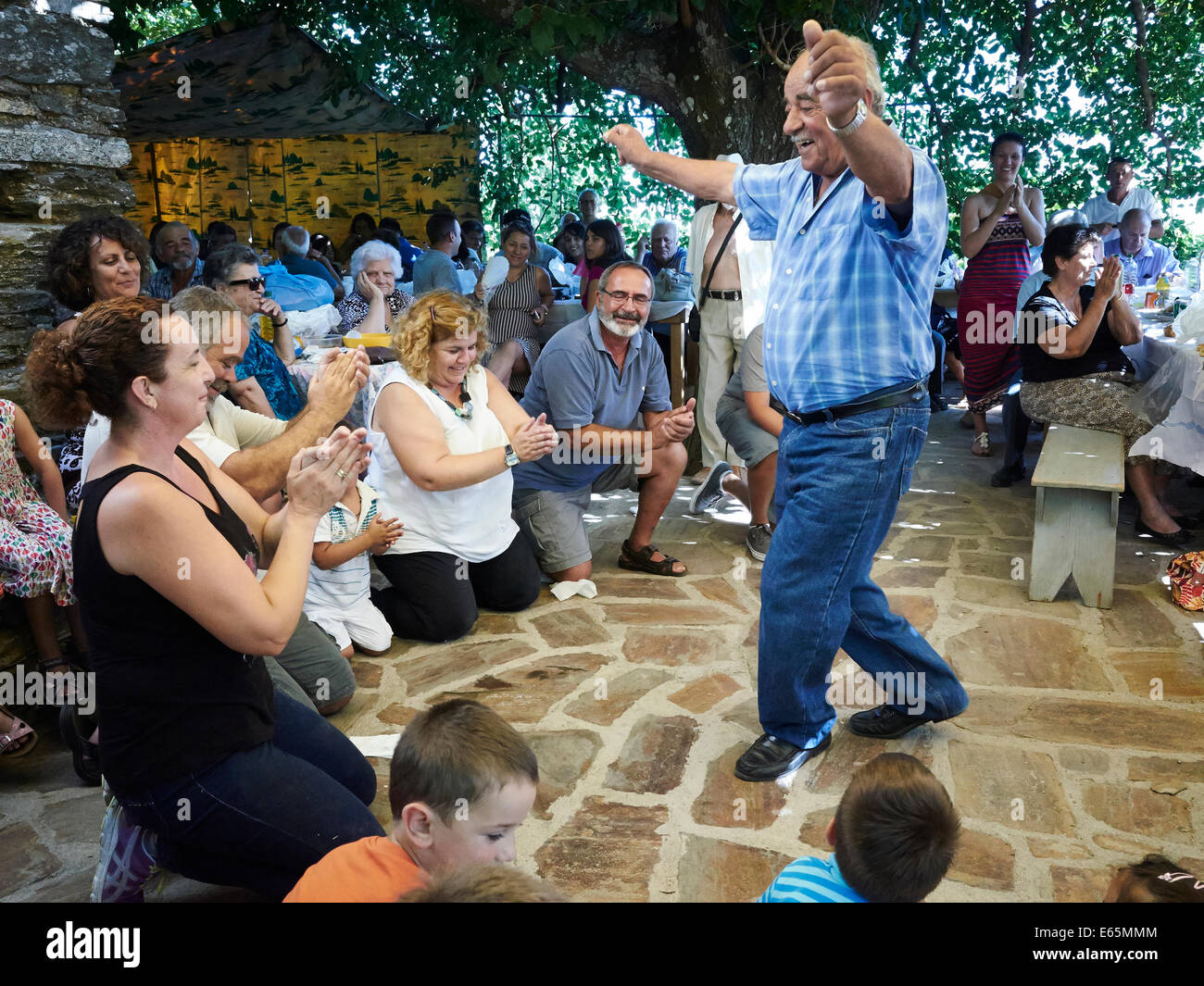 Ikaria island, Greece. 15th August 2014. Villagers dance at a panegyri ...