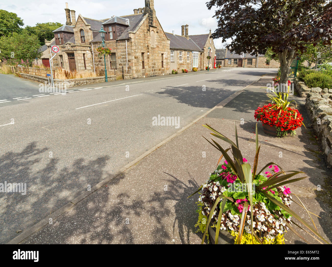 TARVES VILLAGE ABERDEENSHIRE SCOTLAND THE MAIN STREET LINED WITH FLOWER ...