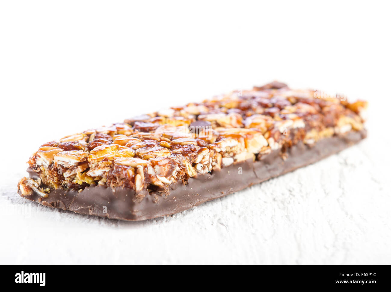 Chocolate Muesli Bars on white wooden background Stock Photo - Alamy