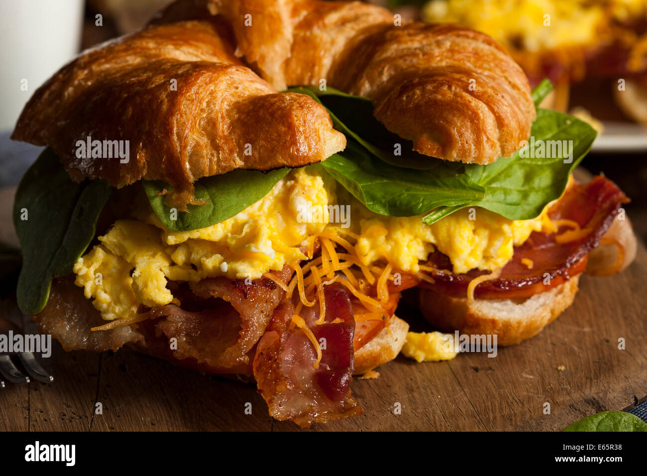 Ham and Cheese Egg Breakfast Sandwich on a Croissant Stock Photo - Alamy