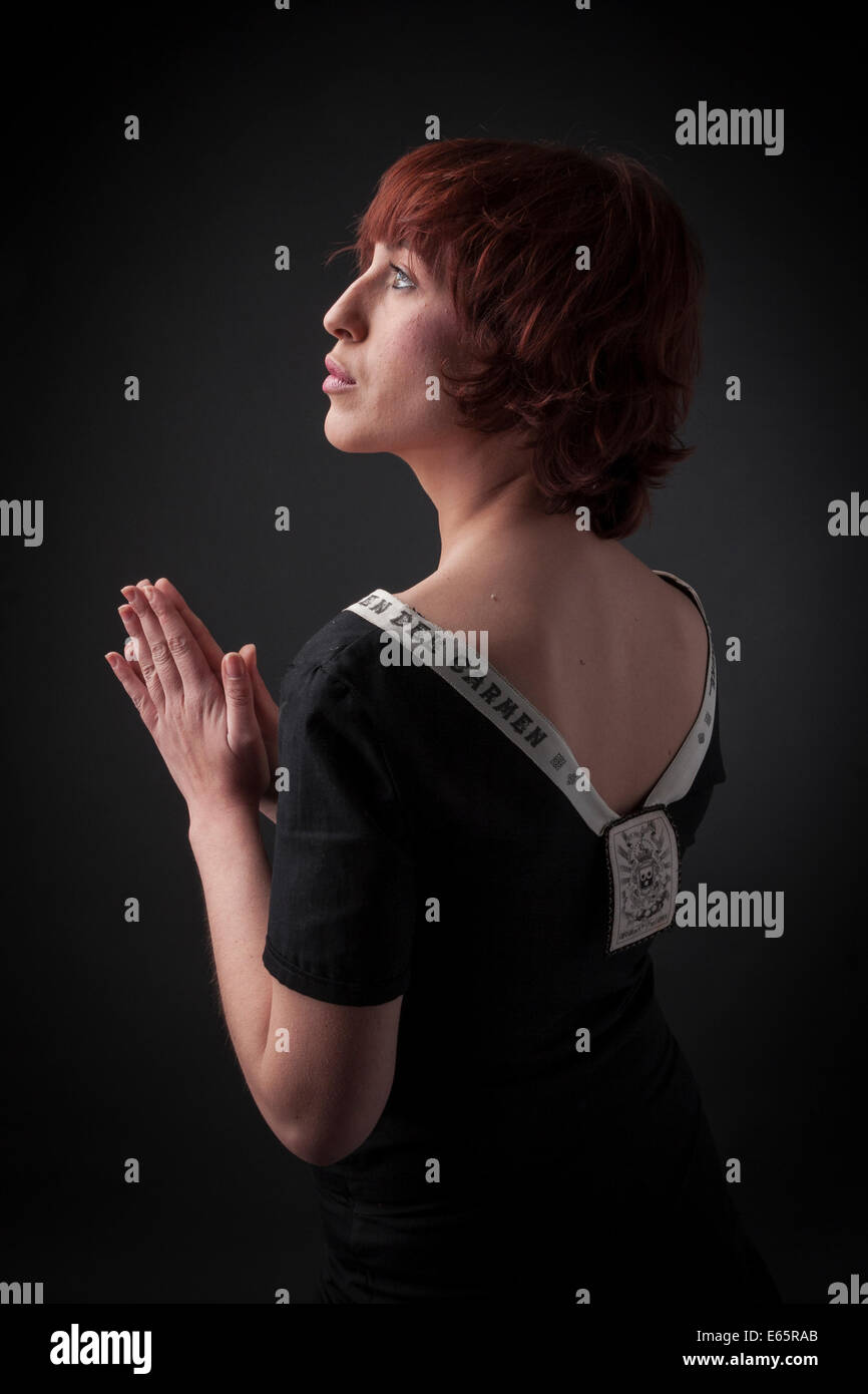 pious woman praying Stock Photo - Alamy