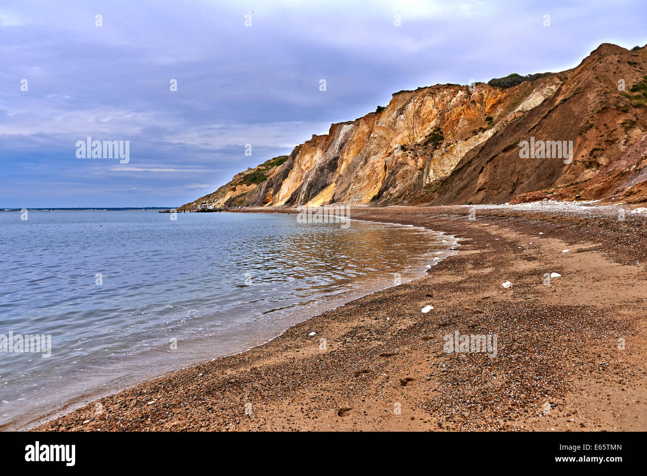 Alum Bay sands are coloured due to oxidised iron compounds formed under ...