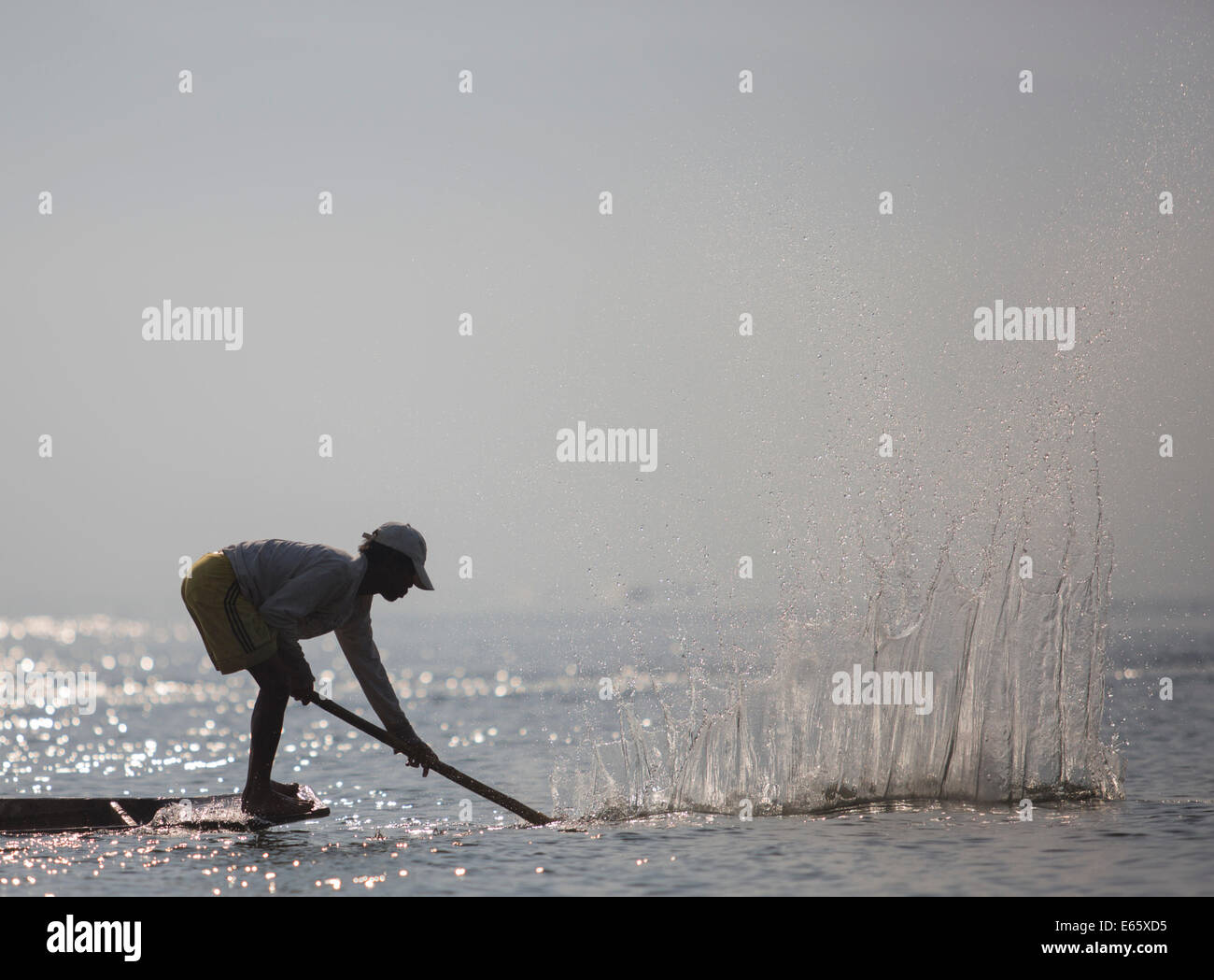 Fisherman using fishing pole catch hi-res stock photography and images ...