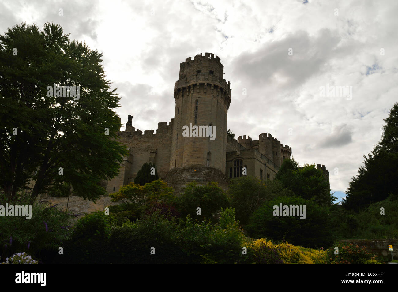 Warwick Castle ramparts & turret against a cloudy sky Stock Photo - Alamy
