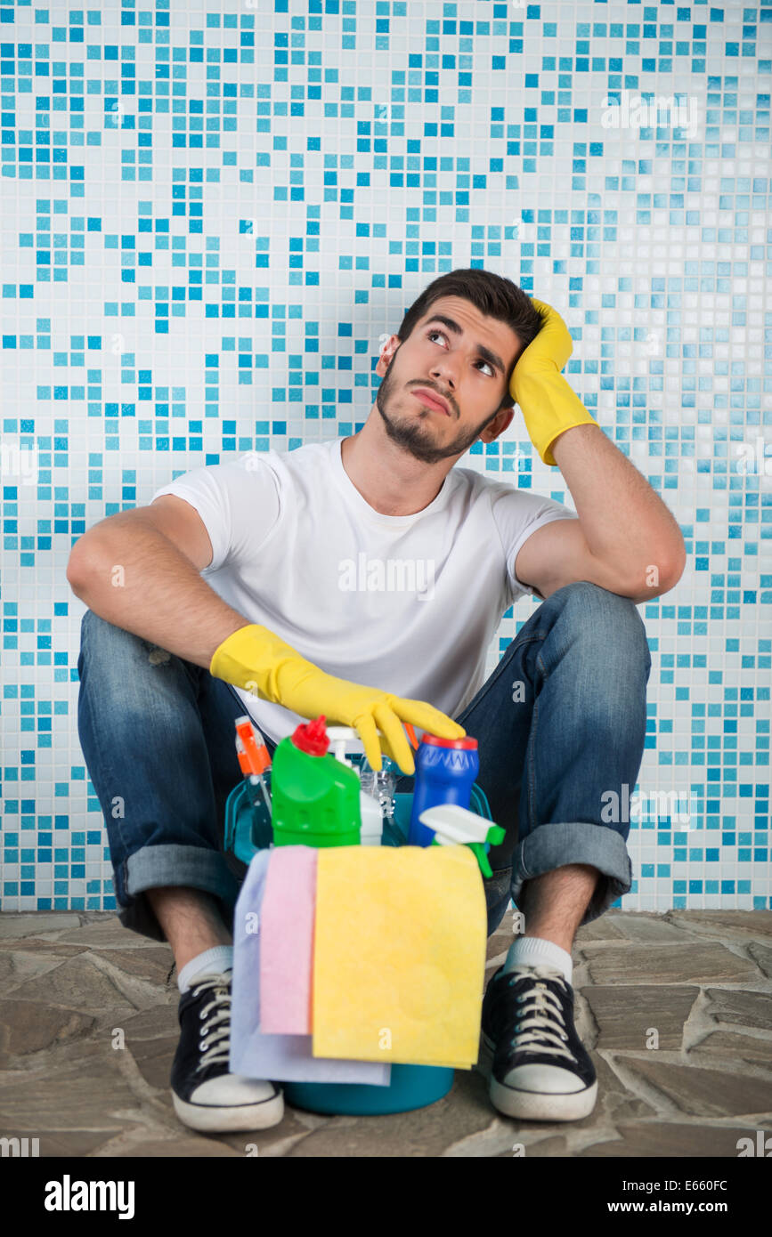 Male janitor sweeping floor hi-res stock photography and images - Alamy