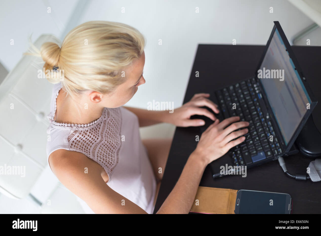 Business woman working from home Stock Photo - Alamy