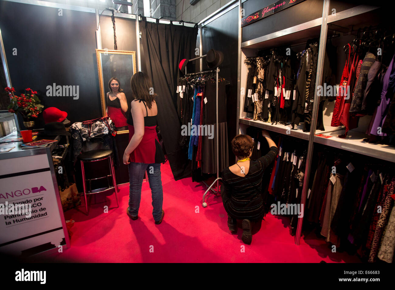 Buenos Aires, Argentina. 15th Aug, 2014. A woman tries on a dress at a ...