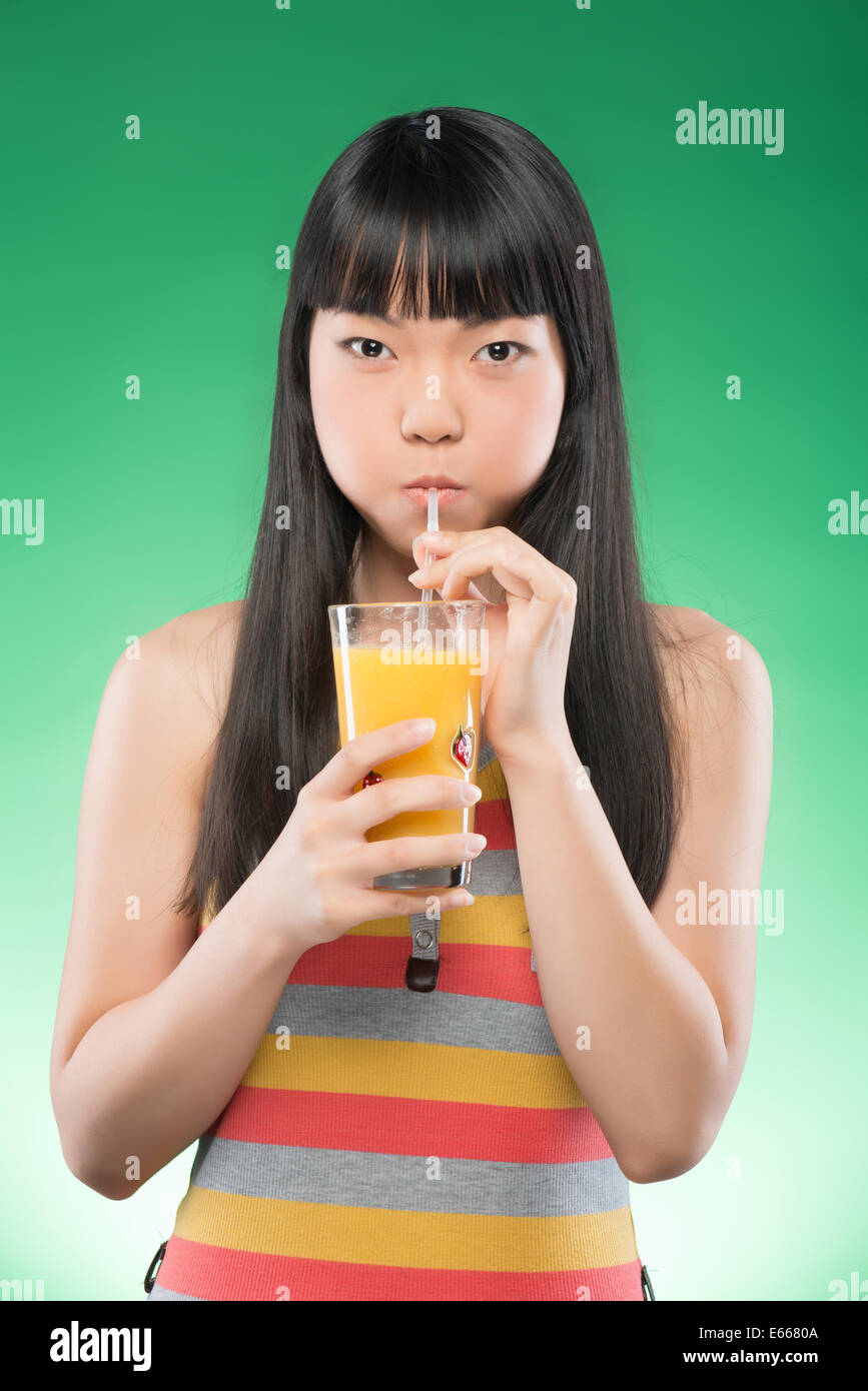 Asian woman and juice Stock Photo - Alamy