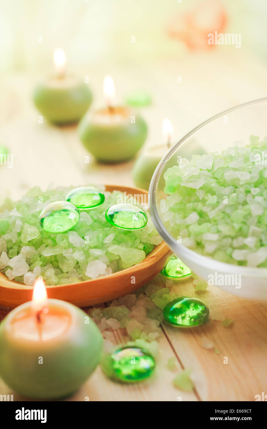 Salt bath with scented candles on at the table Stock Photo - Alamy