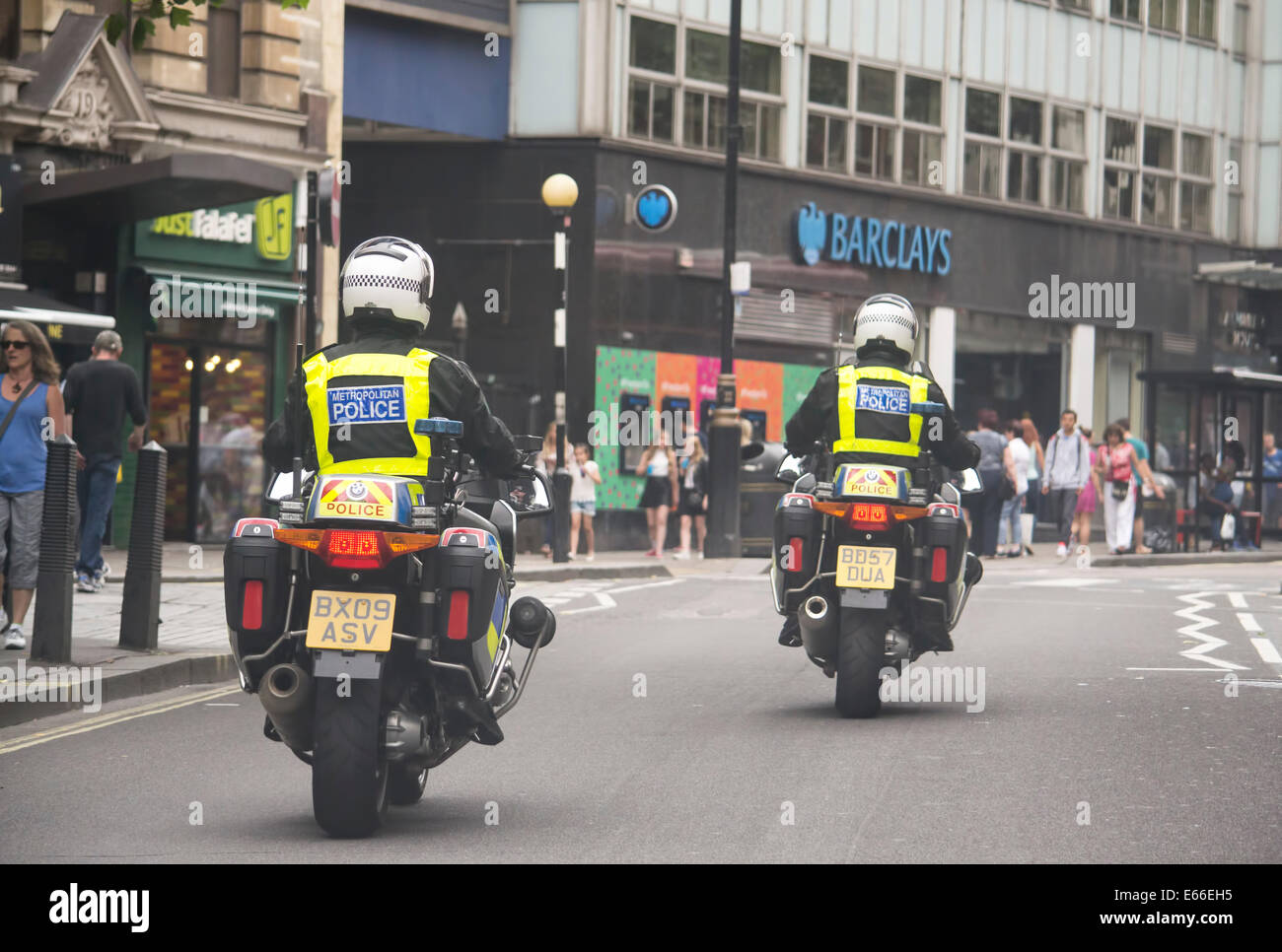 Police officers on motorcycles in London Stock Photo - Alamy