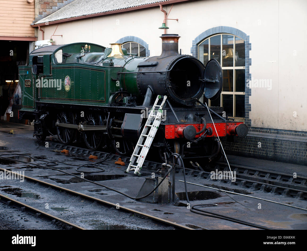 Steam engine being serviced at Minehead Station, Somerset, UK Stock ...