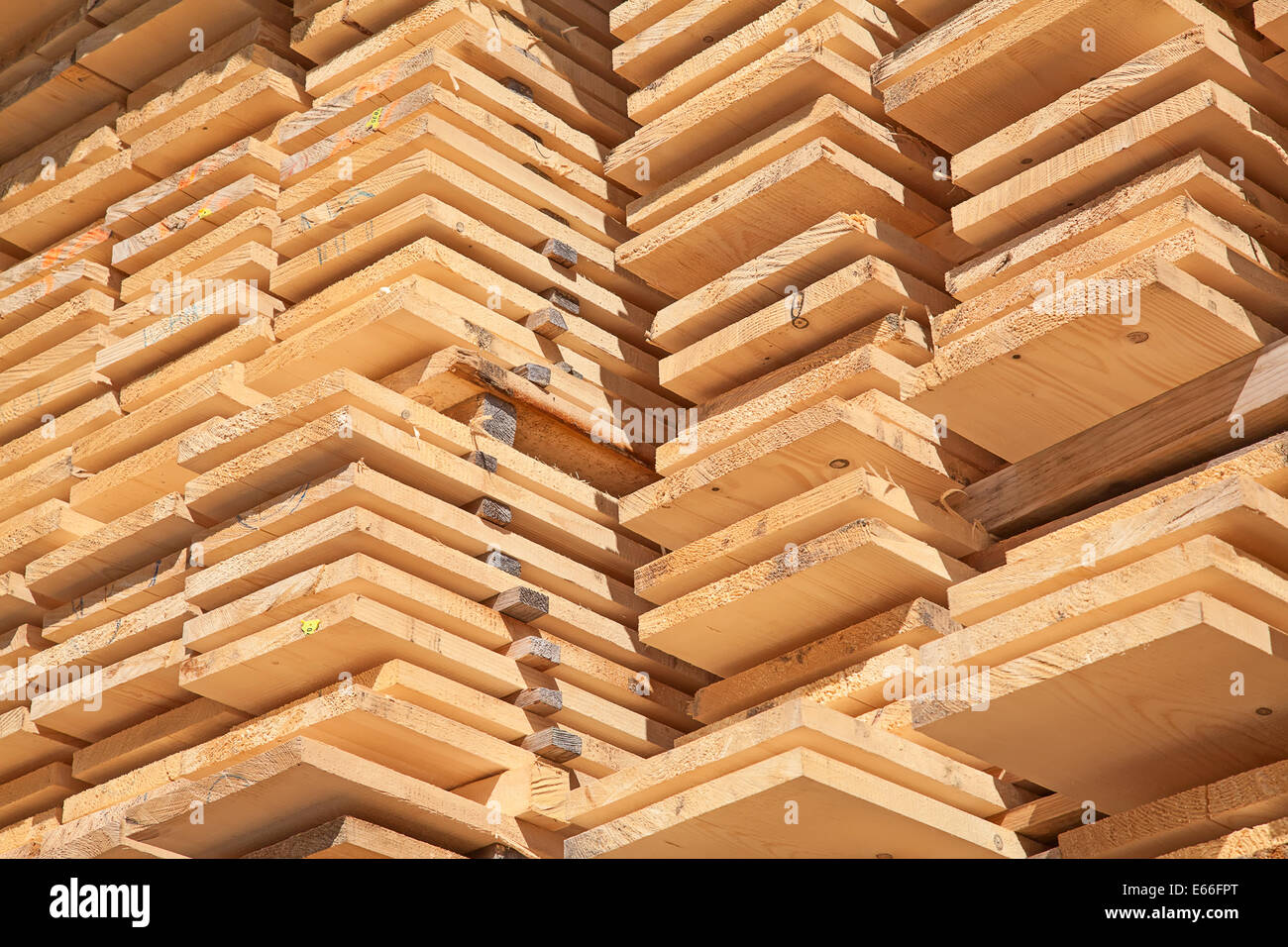 Stack of new wooden studs at the lumber yard Stock Photo - Alamy