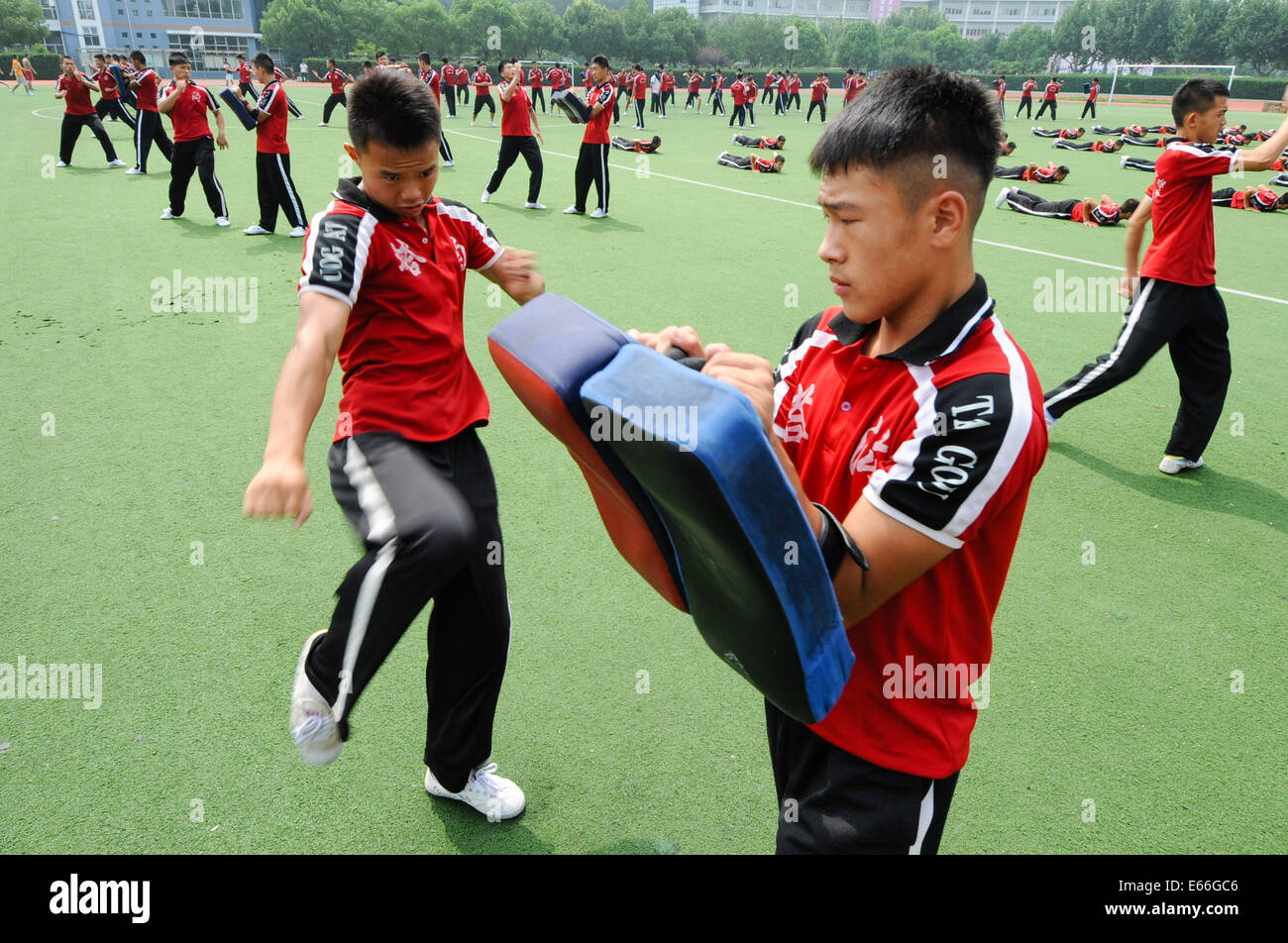 Nanjing, China. 15th Aug, 2014. Young performers from Songshan Shaolin ...